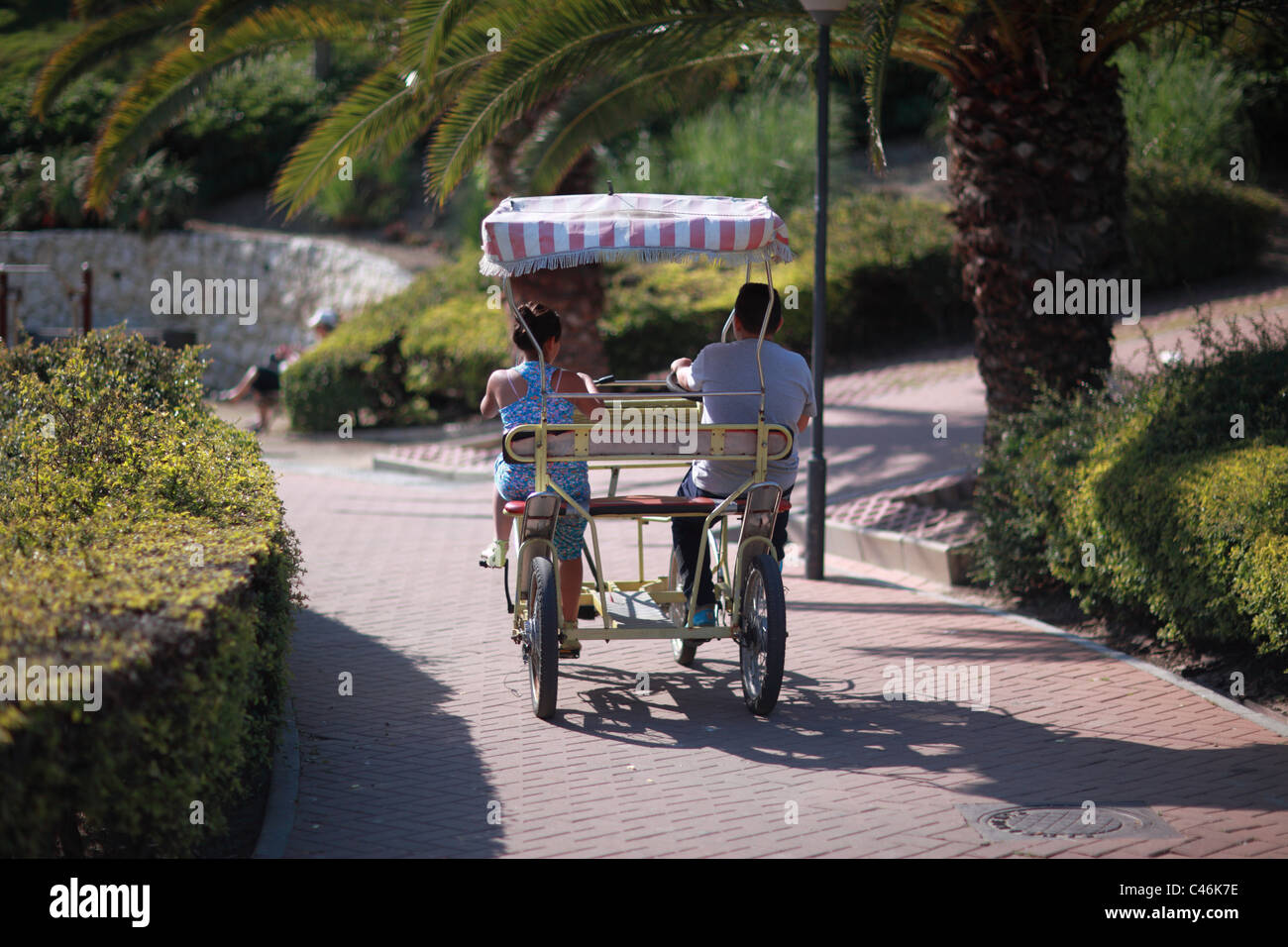 Couple Riding Quad Cycle Stock Photo - Alamy