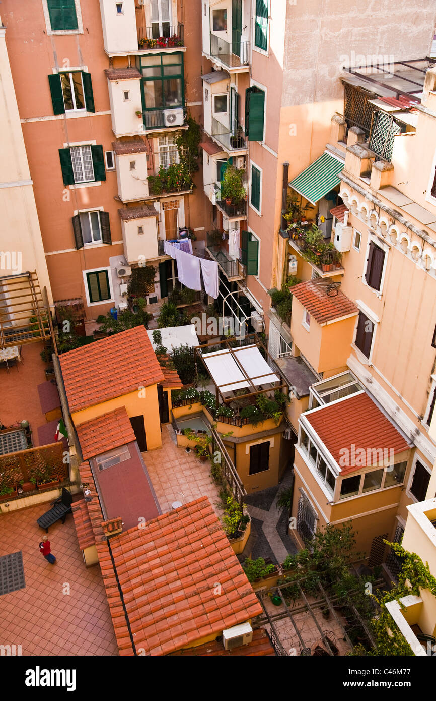 A view looking down into an apartment courtyard complex in Rome, Italy ...
