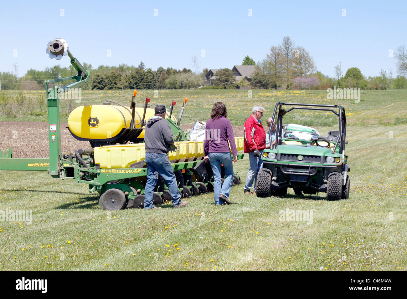 Workers prepare for sowing a seed demonstration plot Stock Photo - Alamy