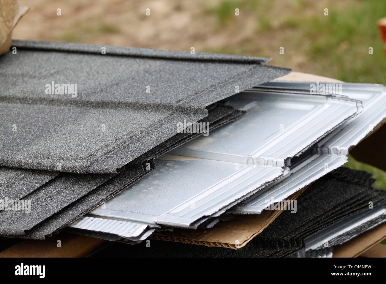 Steel shingles in a stack await installation on a new home Stock Photo ...