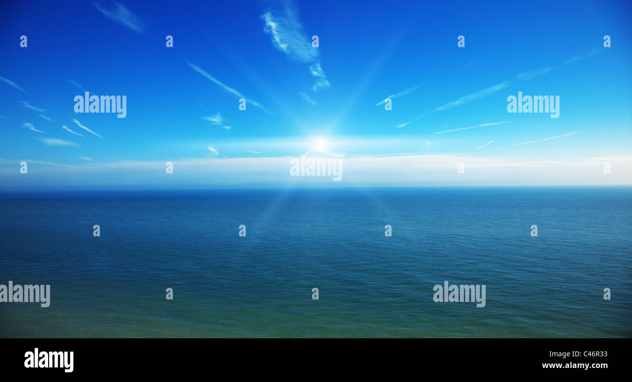 Sun shines above the ocean Stock Photo - Alamy
