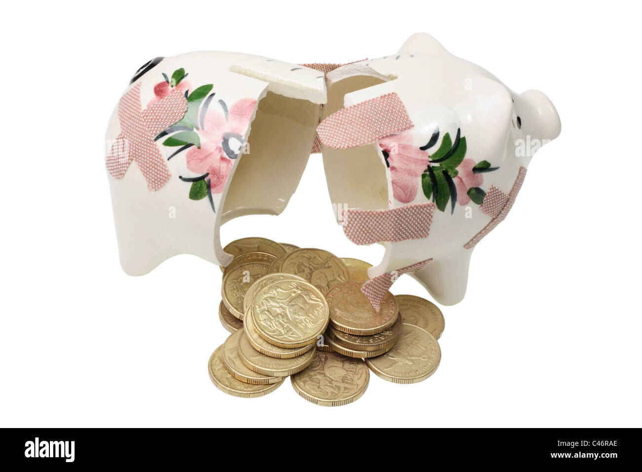 Broken Piggy Bank and Coins Stock Photo - Alamy