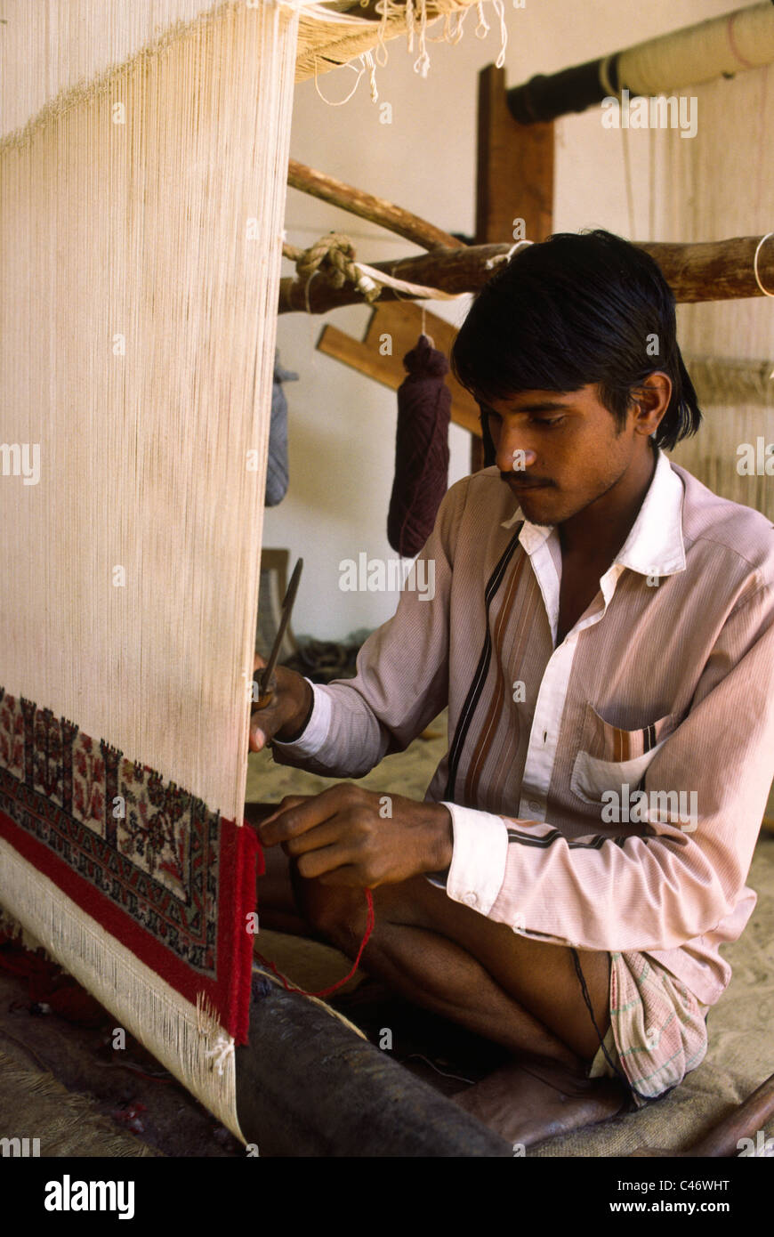 A man sitting at loom weaving hi-res stock photography and images - Alamy