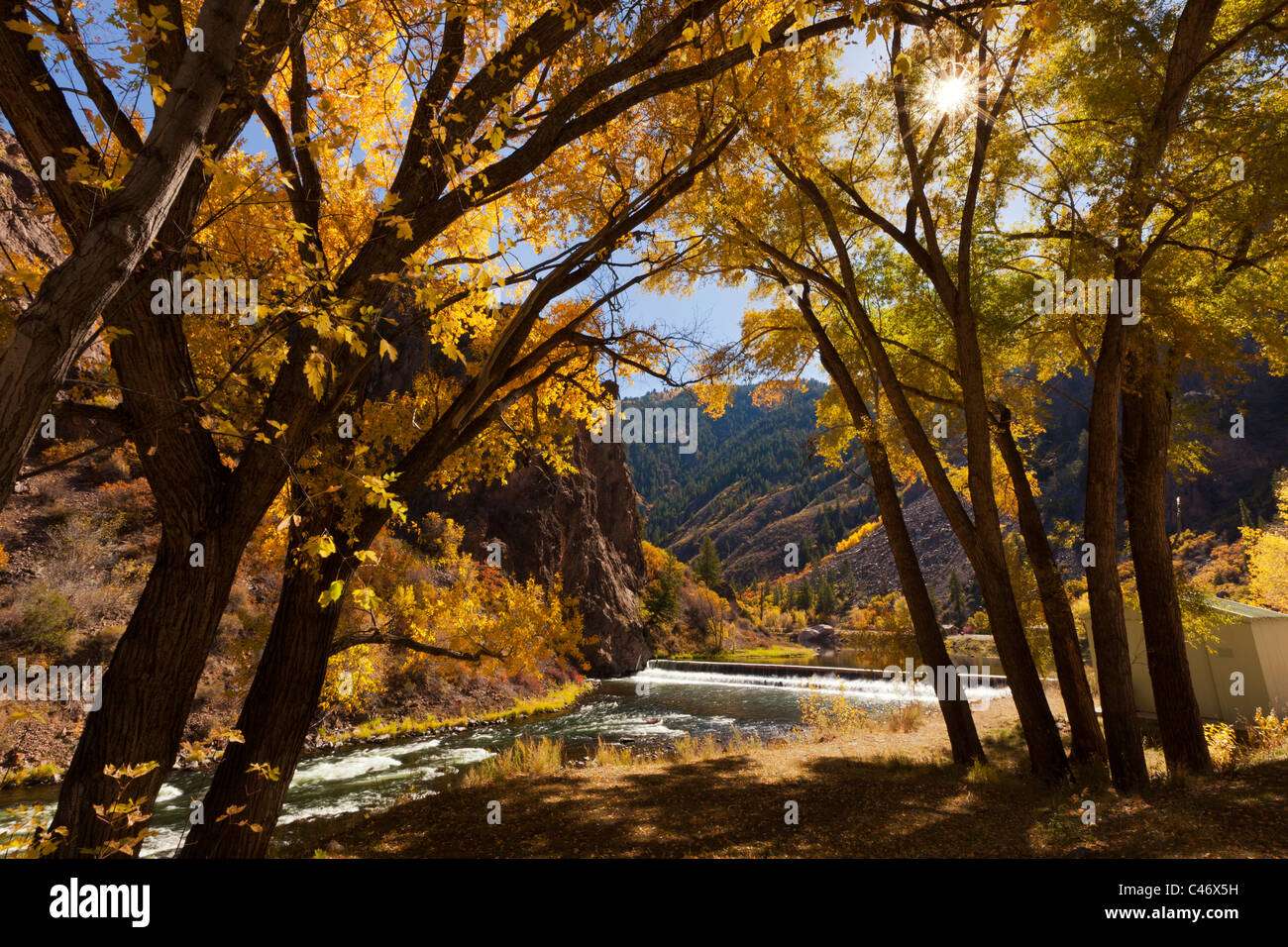 Scenic brilliant fall color of panoramic autumn leaf display and river ...
