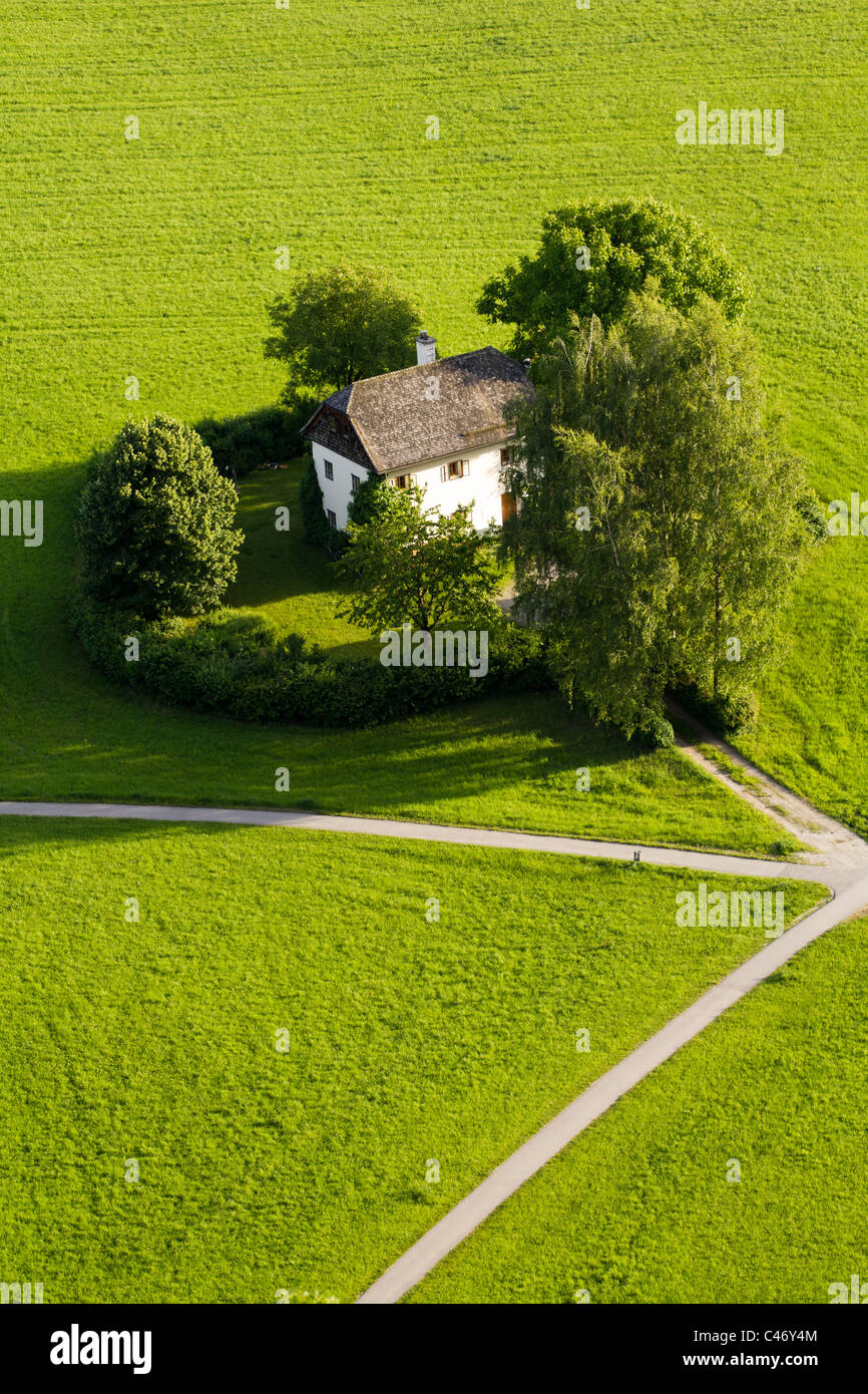House in a Meadow Stock Photo - Alamy
