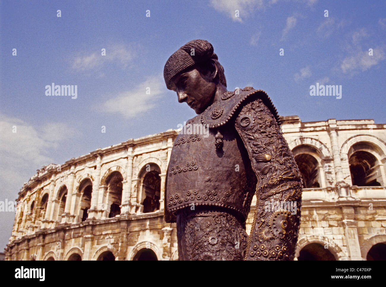 Matador statue in front of Arena of Nimes, a Roman amphitheater built ...
