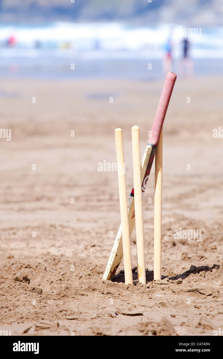 Cricket game on a beach in the UK Stock Photo - Alamy