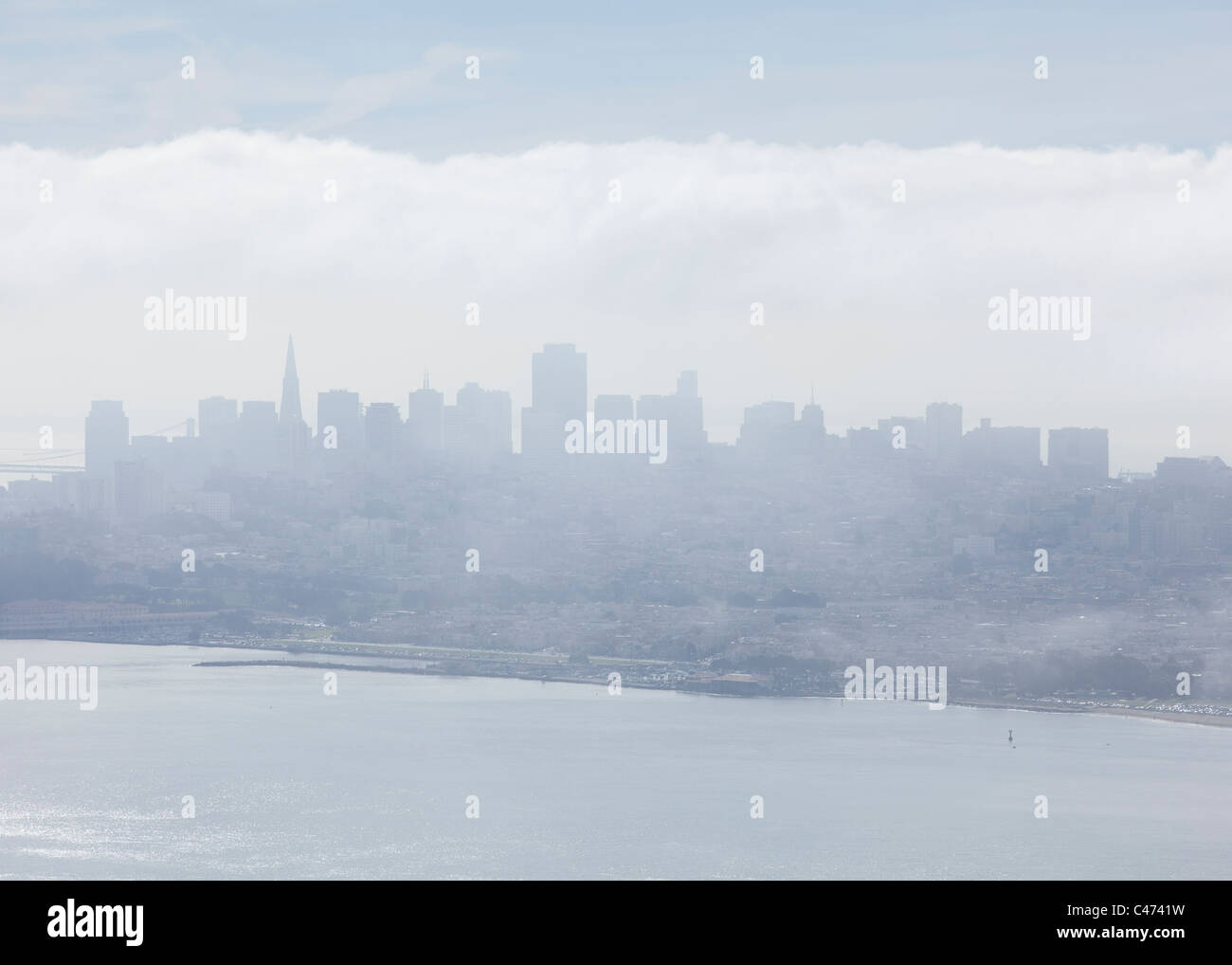 Downtown San Francisco skyline through fog Stock Photo - Alamy