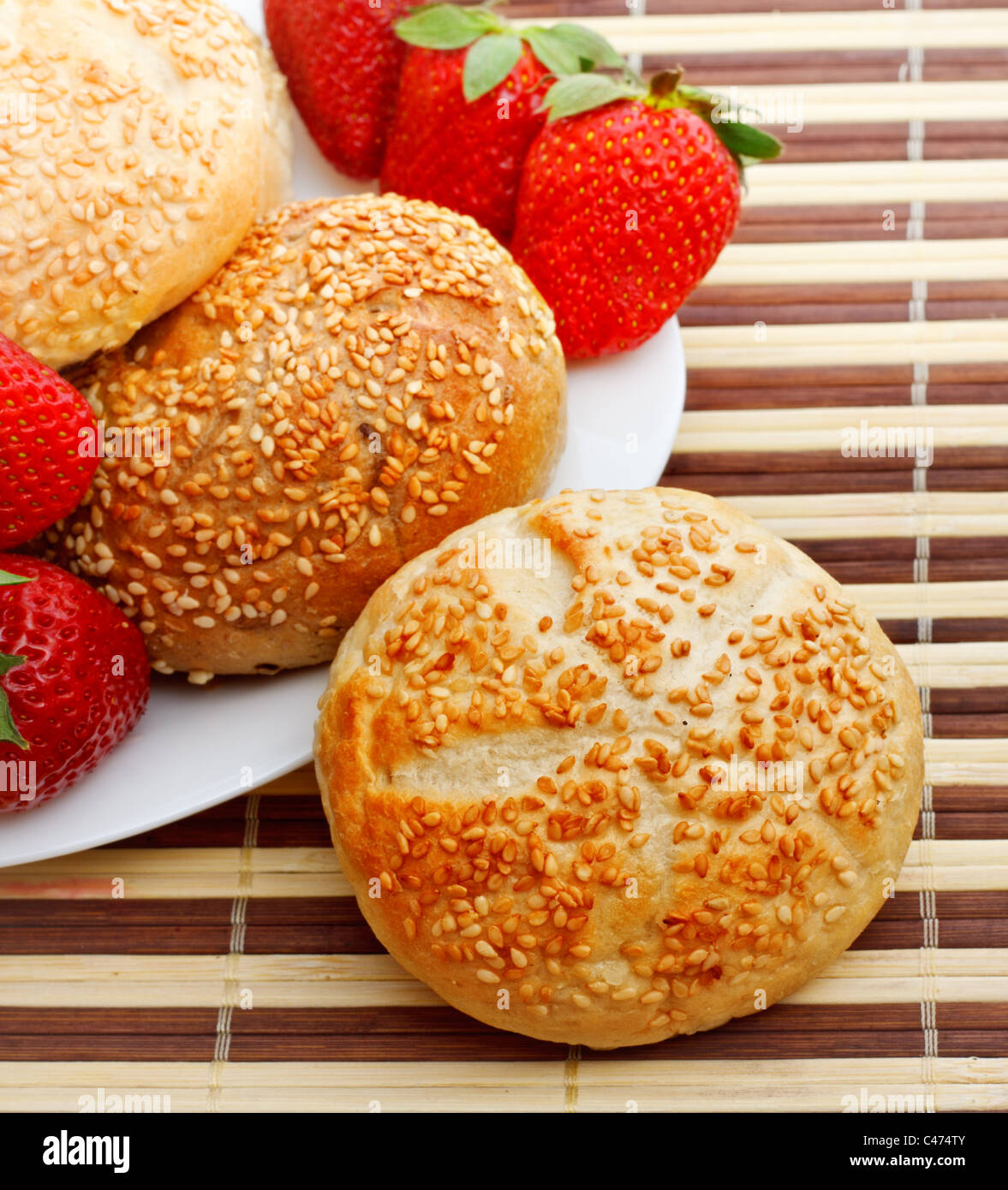 breakfast with sesame buns and strawberry, top view Stock Photo - Alamy