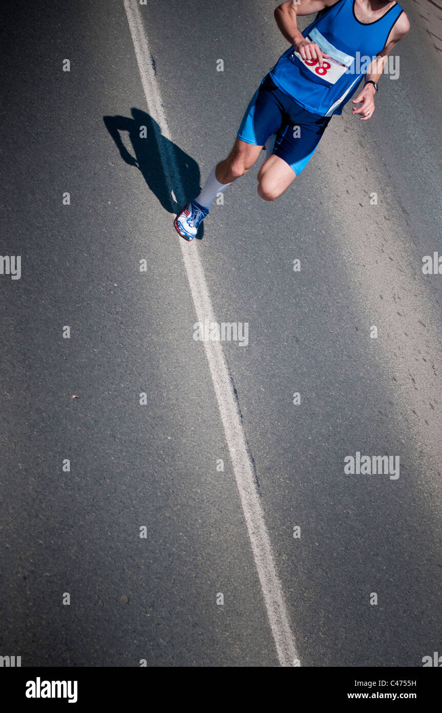 legs of a marathon runner Stock Photo - Alamy