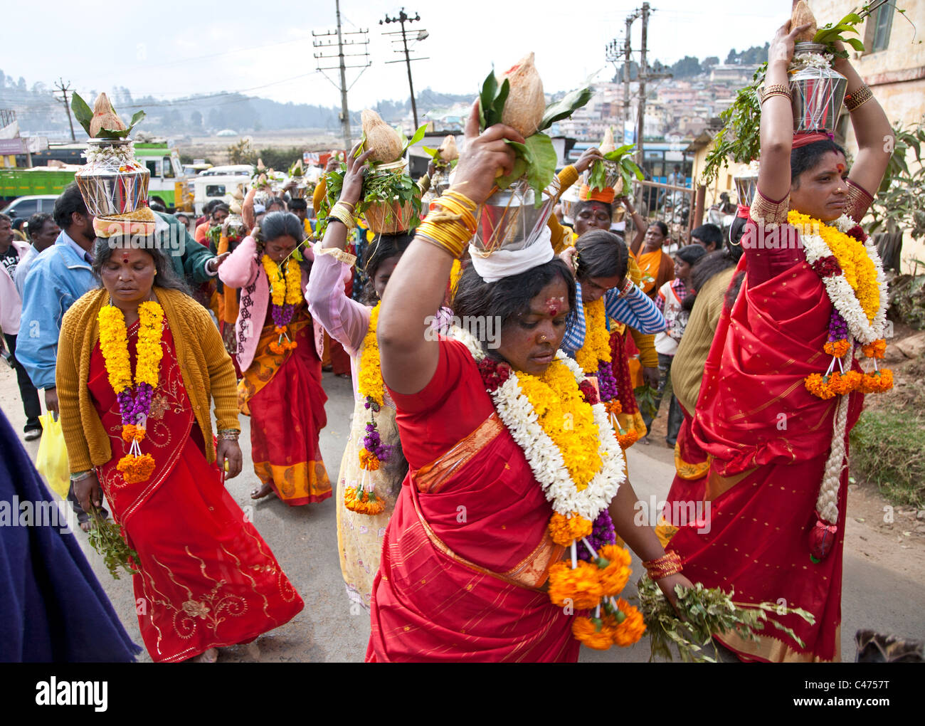 Women performing a religious procession. Ooty (Udhagamandalam). Western ...