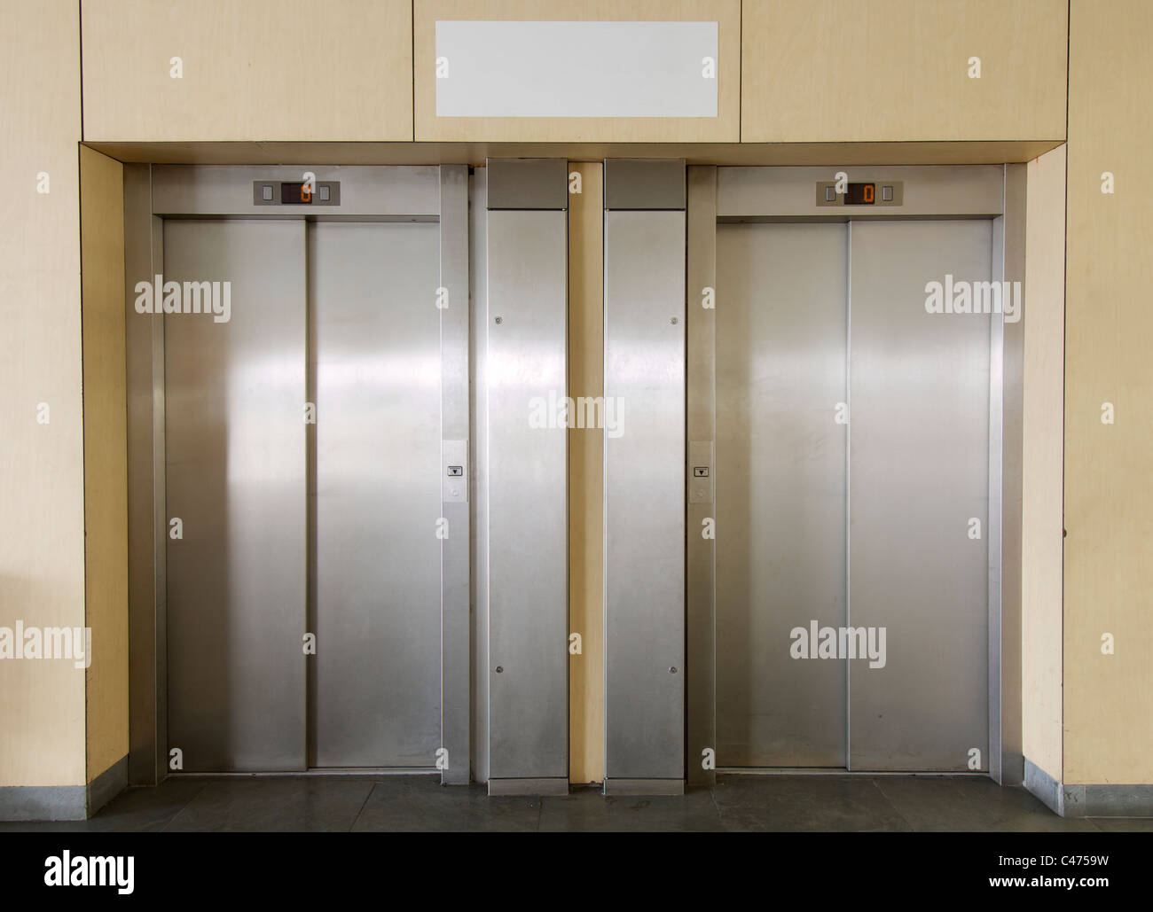 two elevators in the interior of a building Stock Photo - Alamy