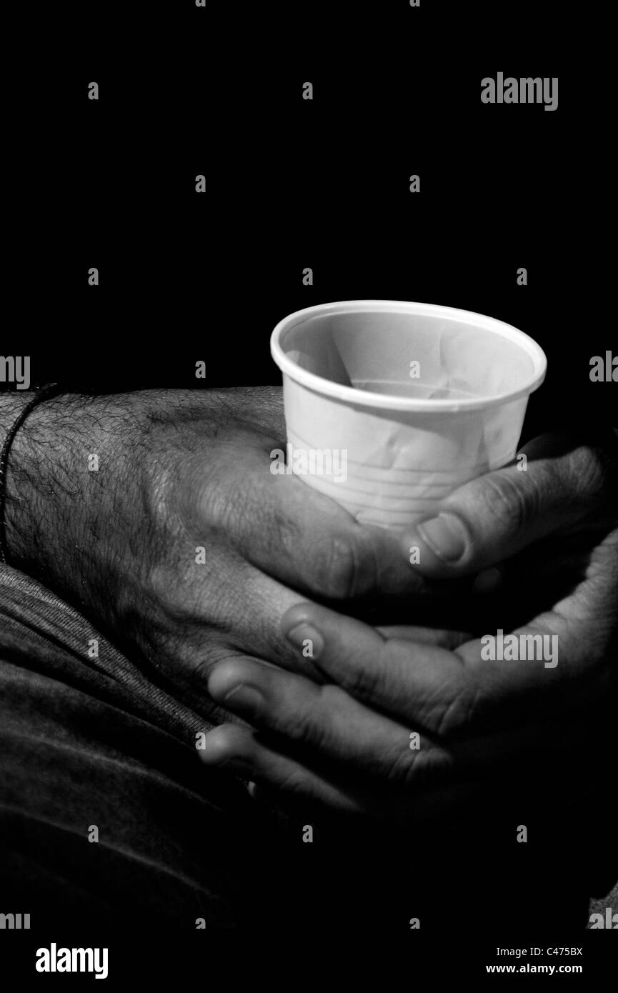 Homeless Holding Cup High Resolution Stock Photography and Images - Alamy
