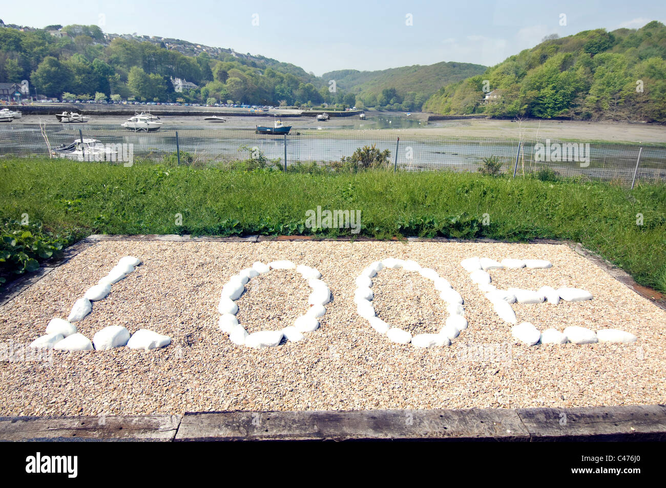A sign made by railway staff at Looe Railway station from whitewashed ...