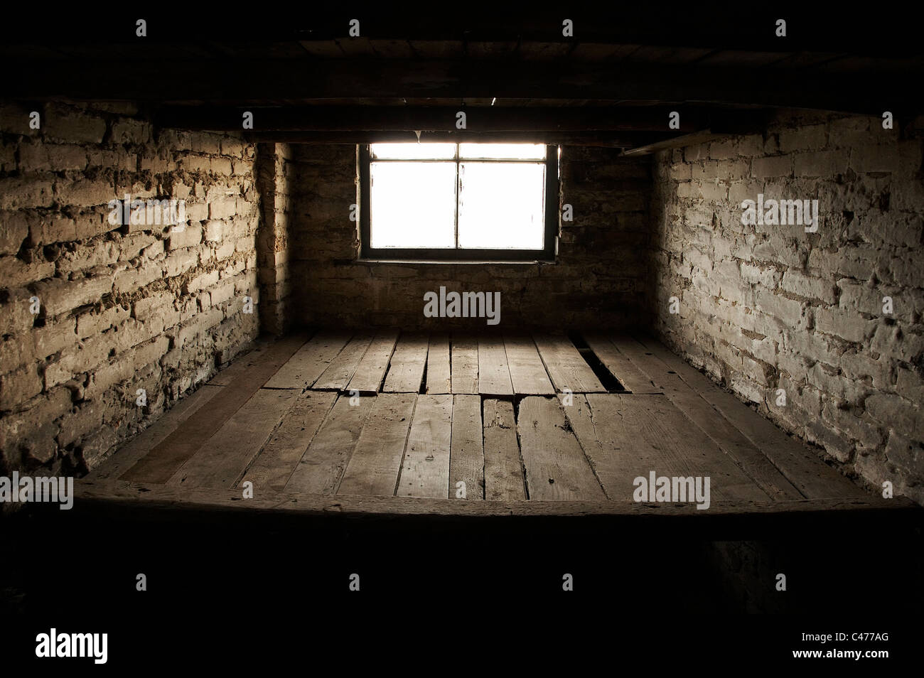A view into a sleeping chamber in concentration camp barrack, Auschwitz ...