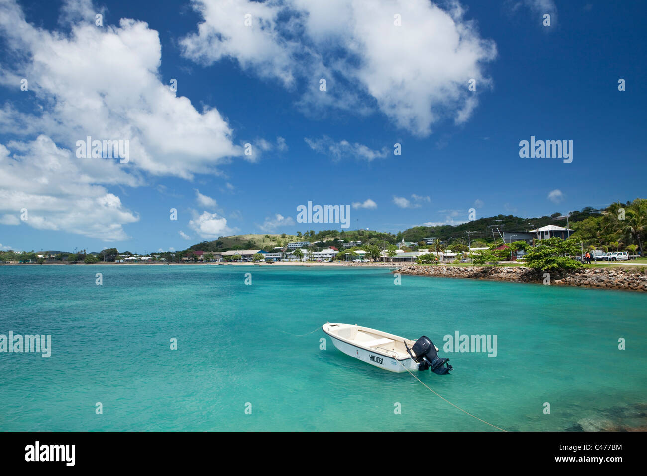 Dinghy with the Thursday Island township in the background. Thursday ...
