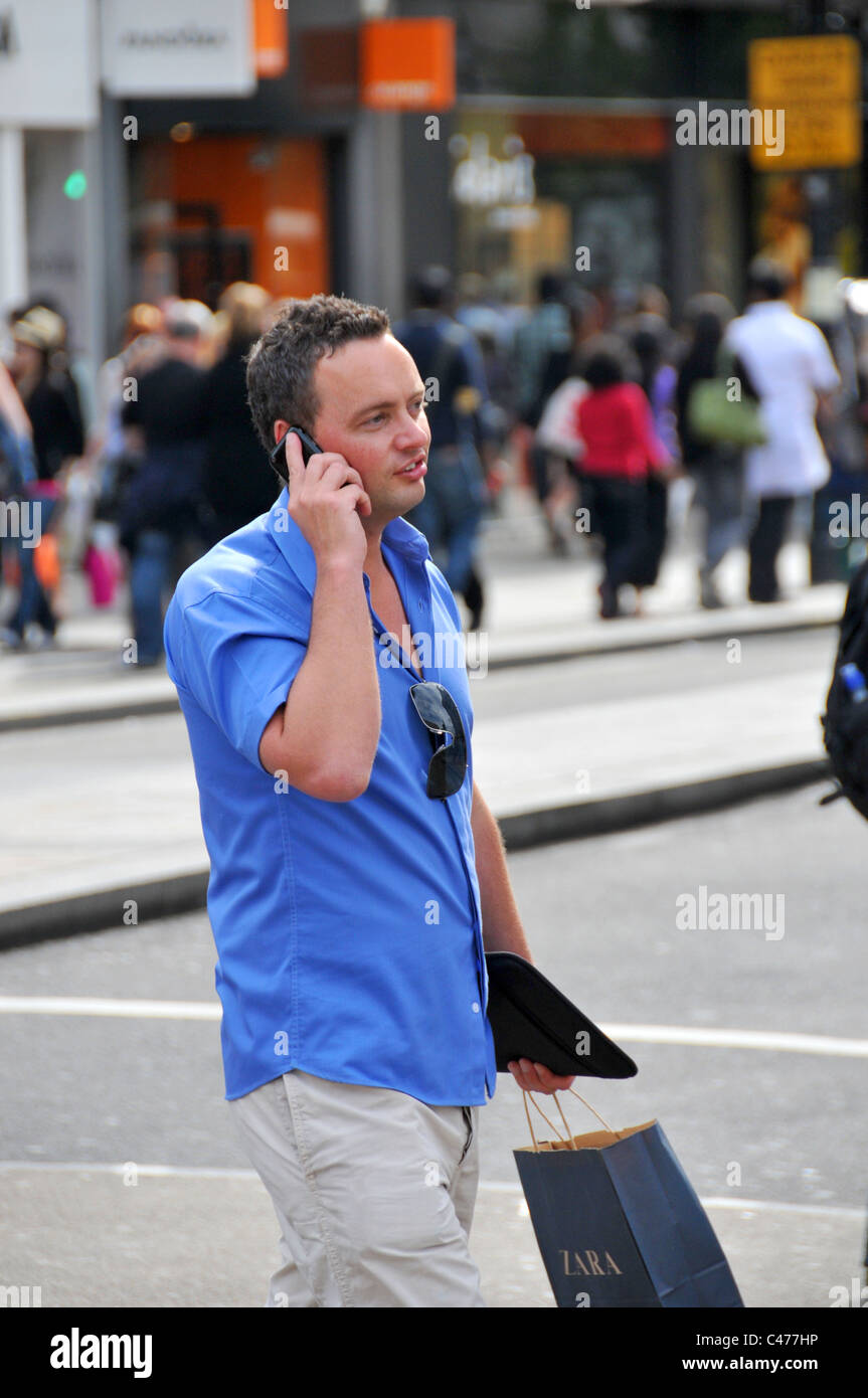 Man walking mobile phone talking street laptop bag walking talking on ...