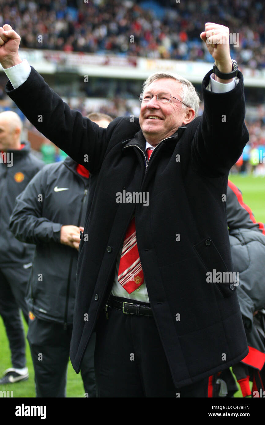 Manchester United manager Sir Alex Ferguson, celebrates winning a 12th ...
