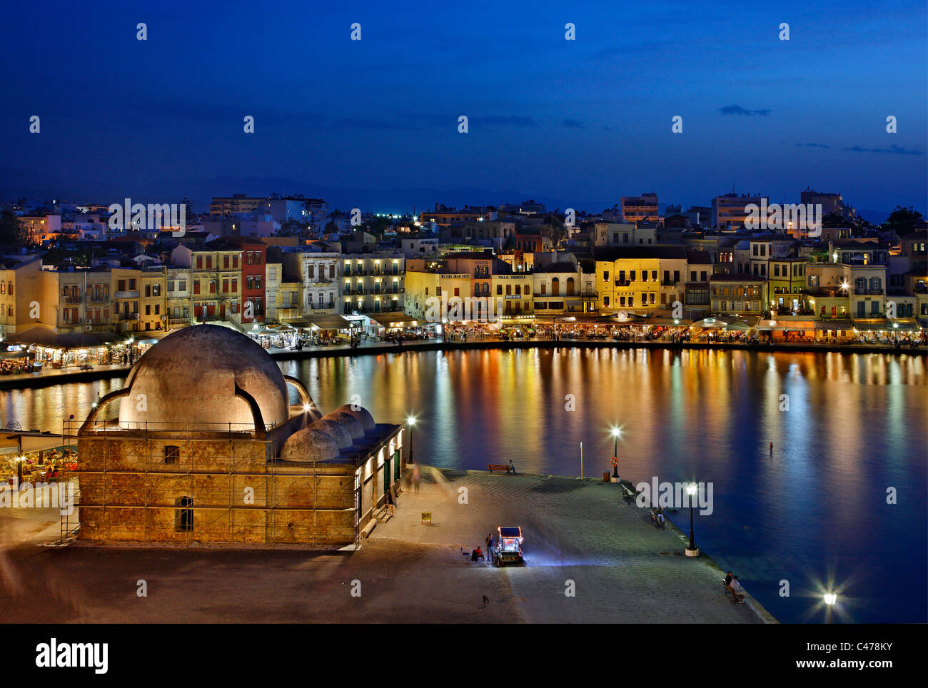 The old Venetian harbor of Chania town in the "blue" hour, Crete island ...