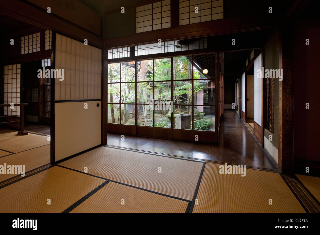 Interior of Kusakabe Mingei-kan (Kusakabe Heritage House) with garden ...