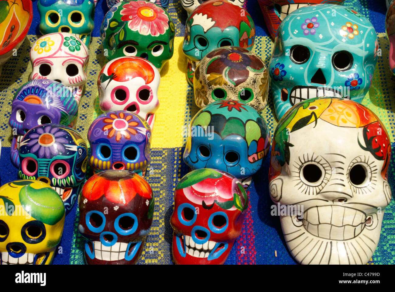Colorful Mexican ceramic skulls or calaveras in Playa del Carmen ...