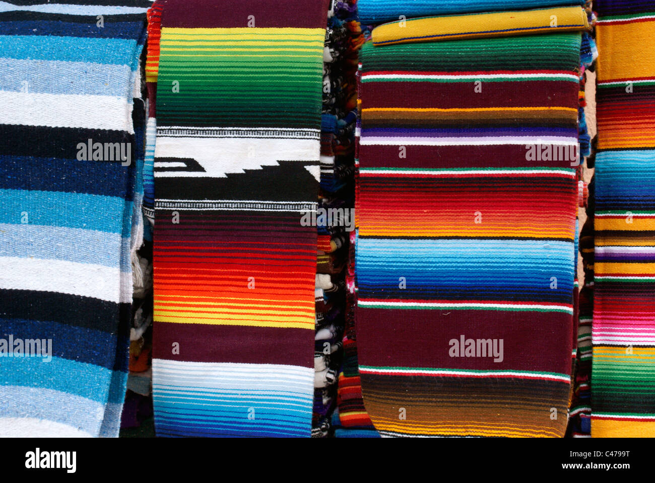 Stacks of Colorful woven Mexican rugs in Playa del Carmen, Riviera Maya ...