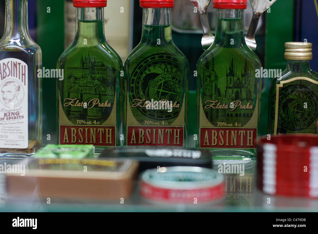 Different bottles of absinthe displayed in a shop window in Prague ...