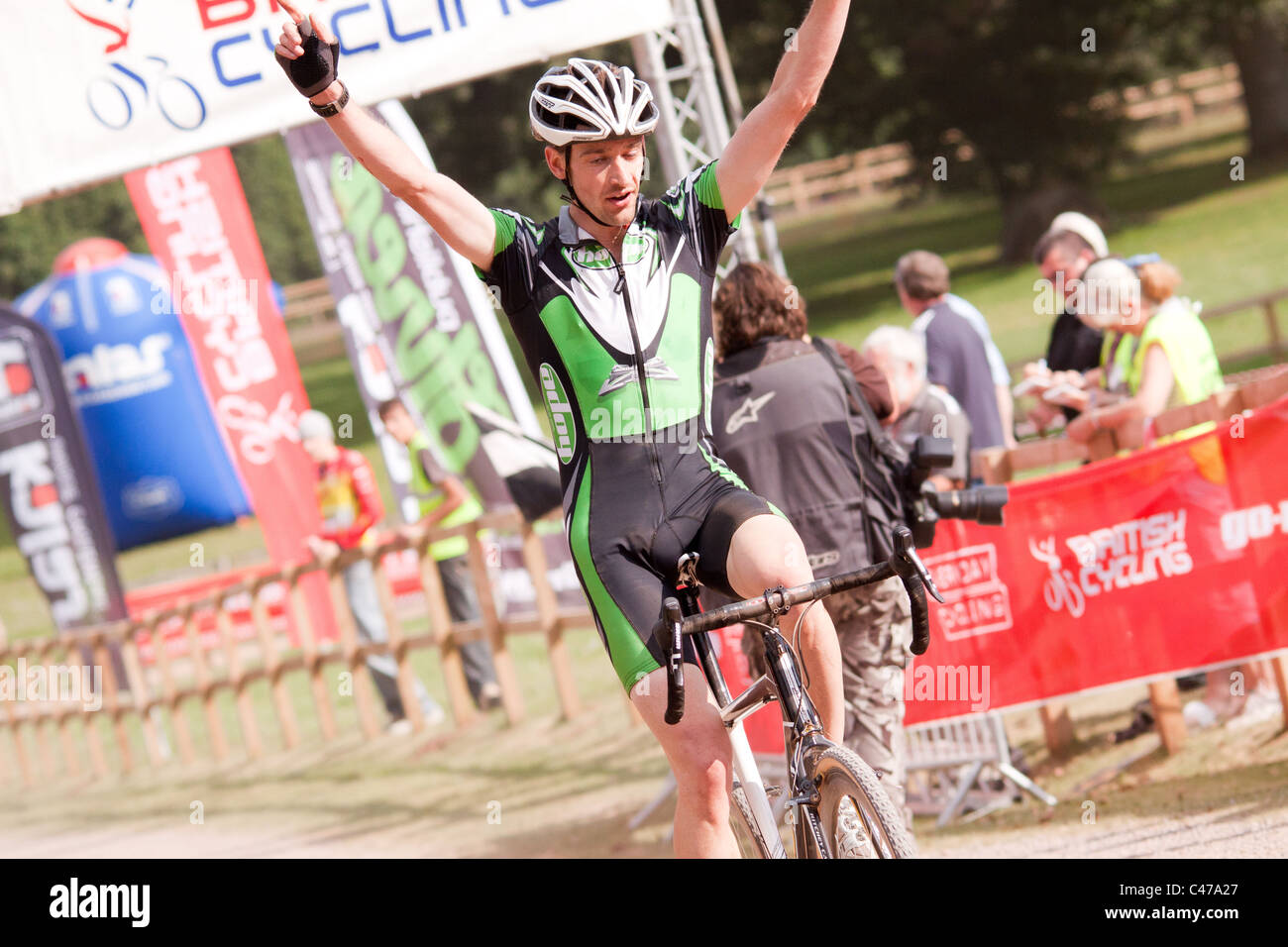 Crossing the finish line Stock Photo - Alamy