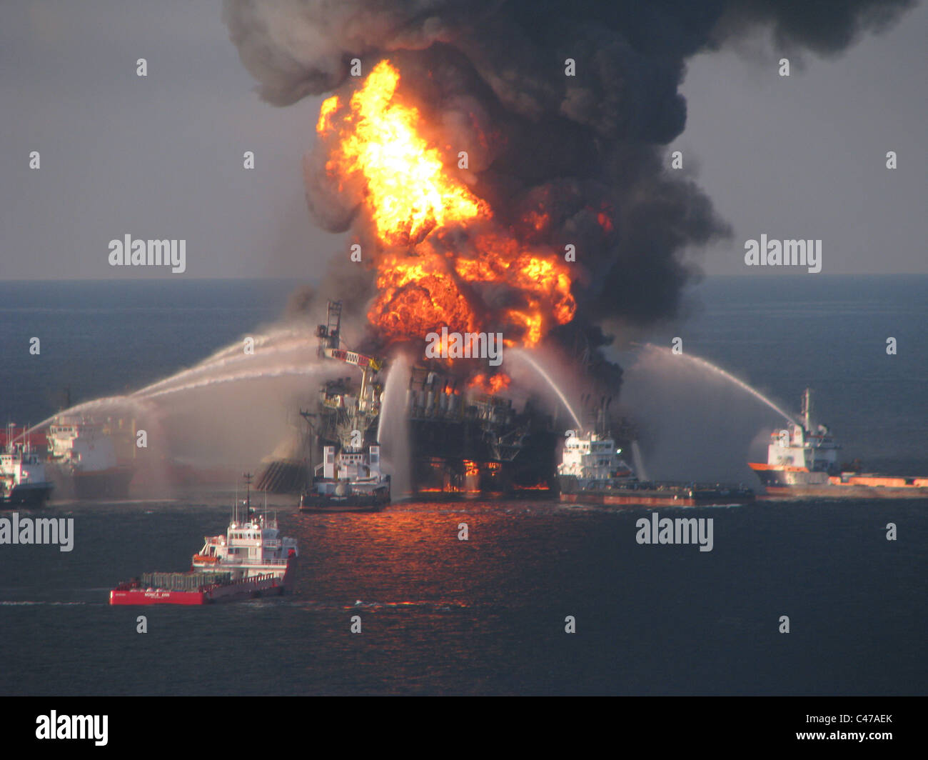 Fire boats battle an explosion at the off shore oil rig Deepwater ...