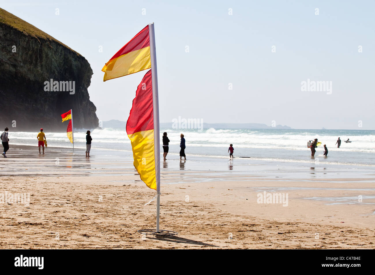 Safety flags at Trebarwith Strand beach in Cornwall, UK Stock Photo - Alamy