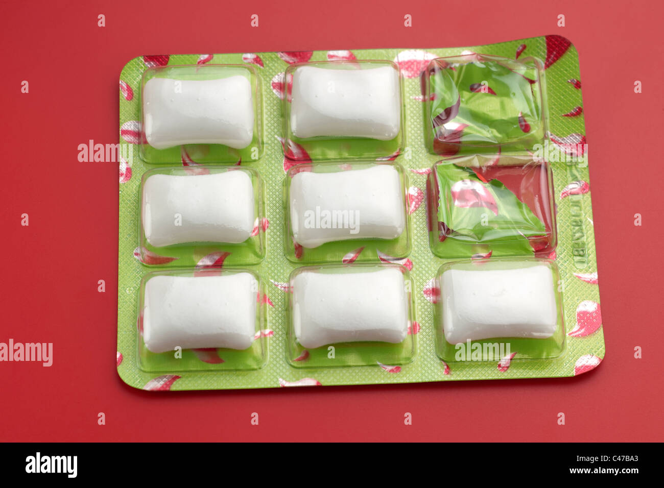 Opened packet of blister pack chewing gum Stock Photo - Alamy