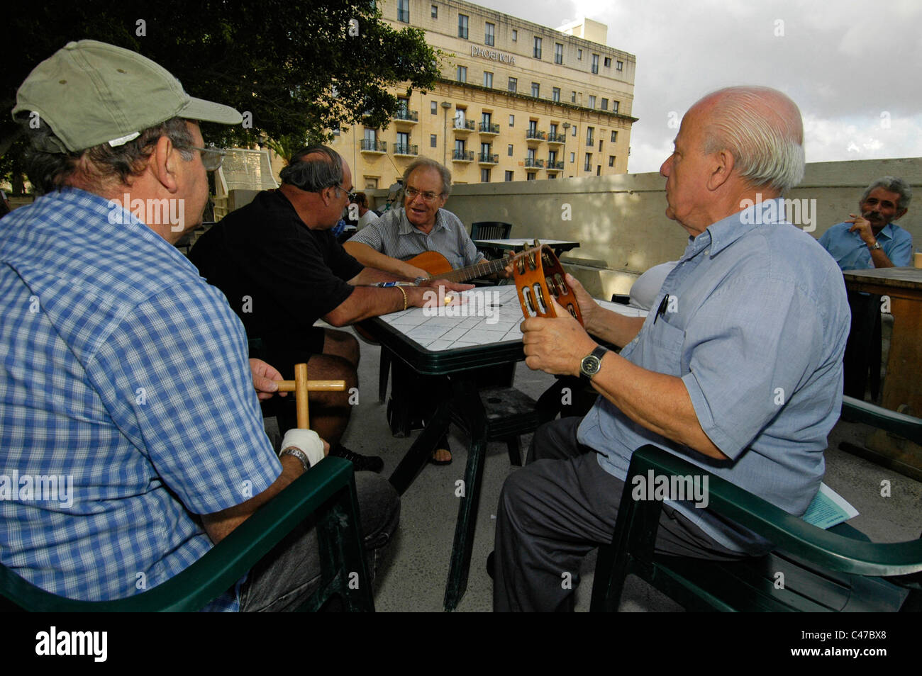 Locals siting and playing traditional Maltese music in Valletta the ...