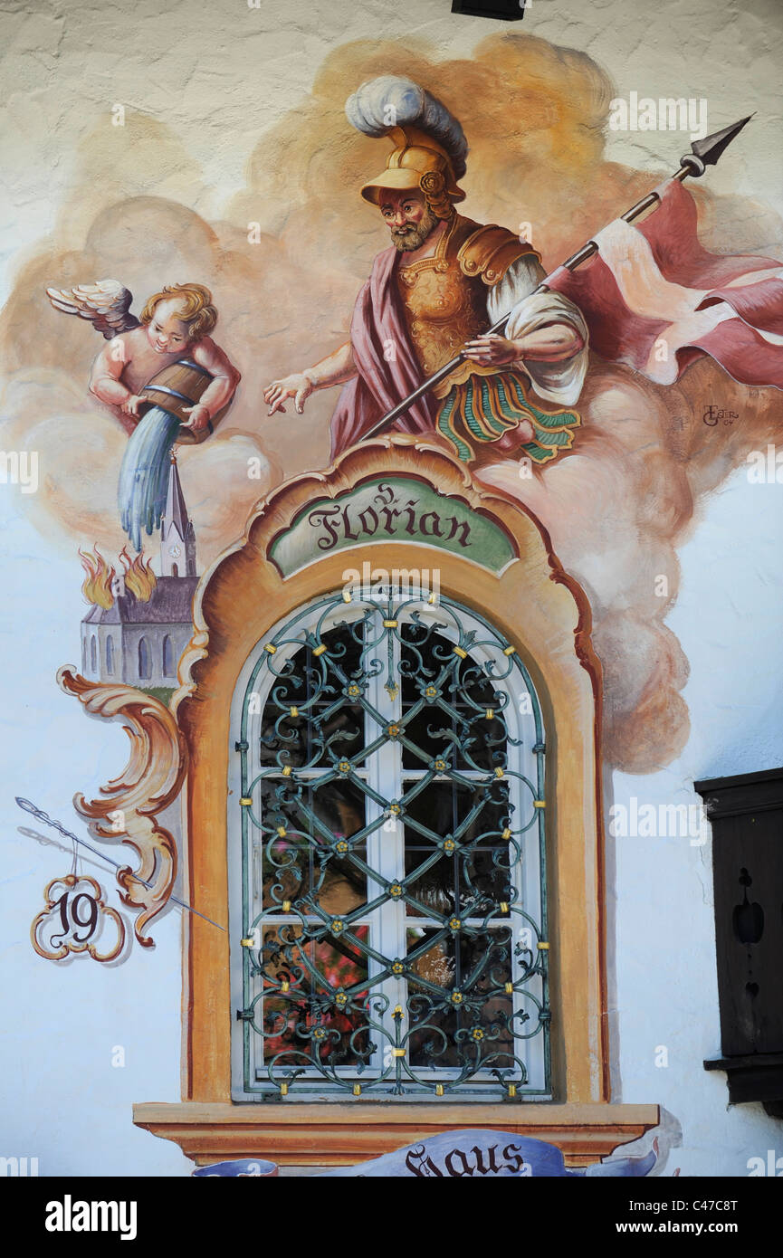 house facade and window decorated with traditional painting in Bavaria ...