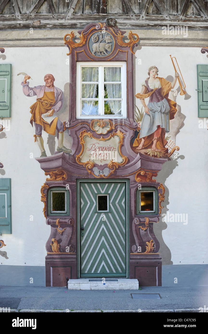 house facade and window decorated with traditional painting in Bavaria ...