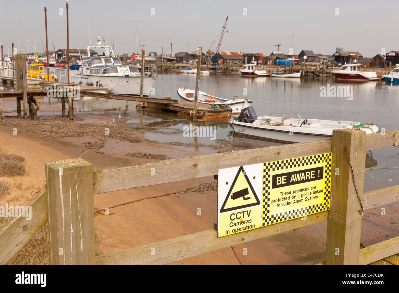 Warning sign about cctv cameras near boats at Walberswick in Suffolk ...