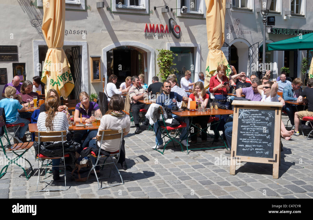 People drinking beer in a cafe bar in Munich, Bavaria, Germany Stock ...