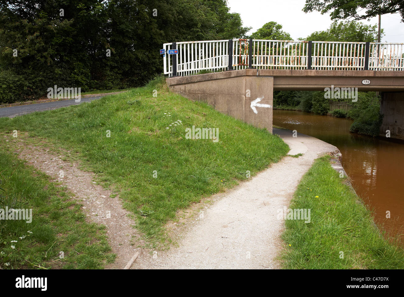 Painted arrow on bridge Stock Photo - Alamy