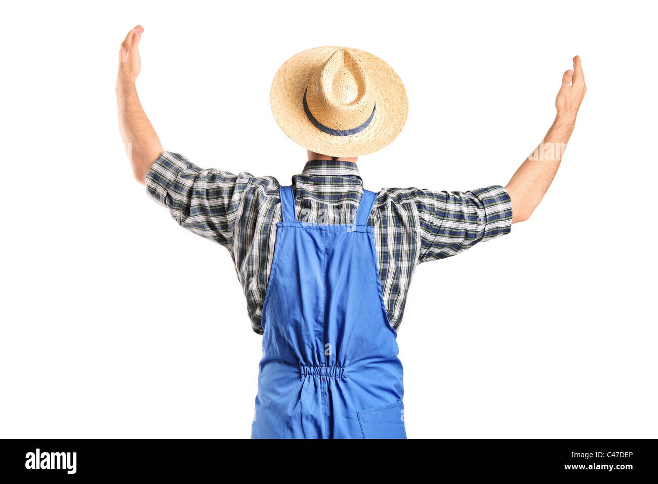 A male farmer gesturing with raised hands Stock Photo - Alamy