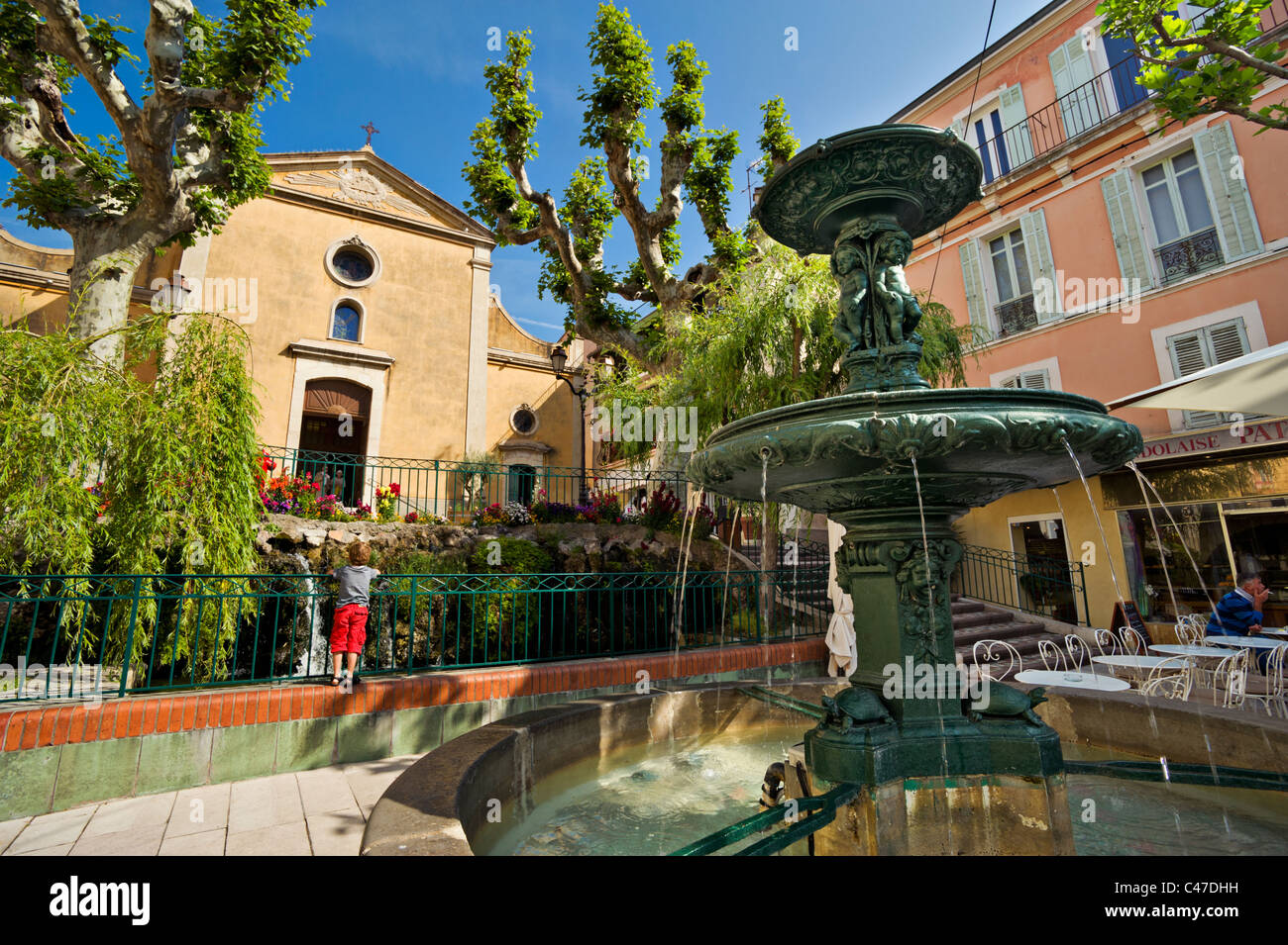 Fountain and church on town square, Bandol, Var, Provence Stock Photo ...