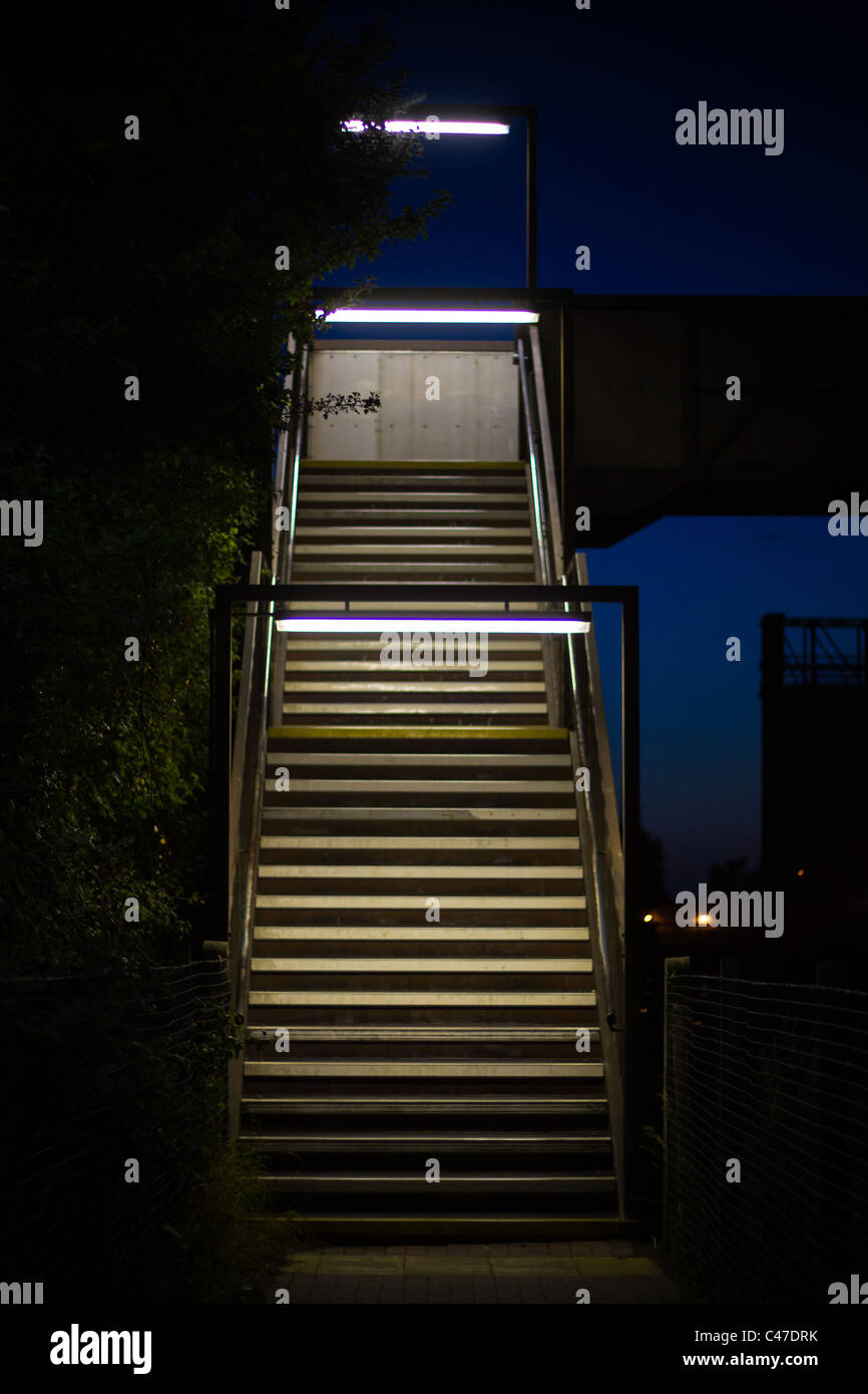 A lit staircase at night Stock Photo - Alamy