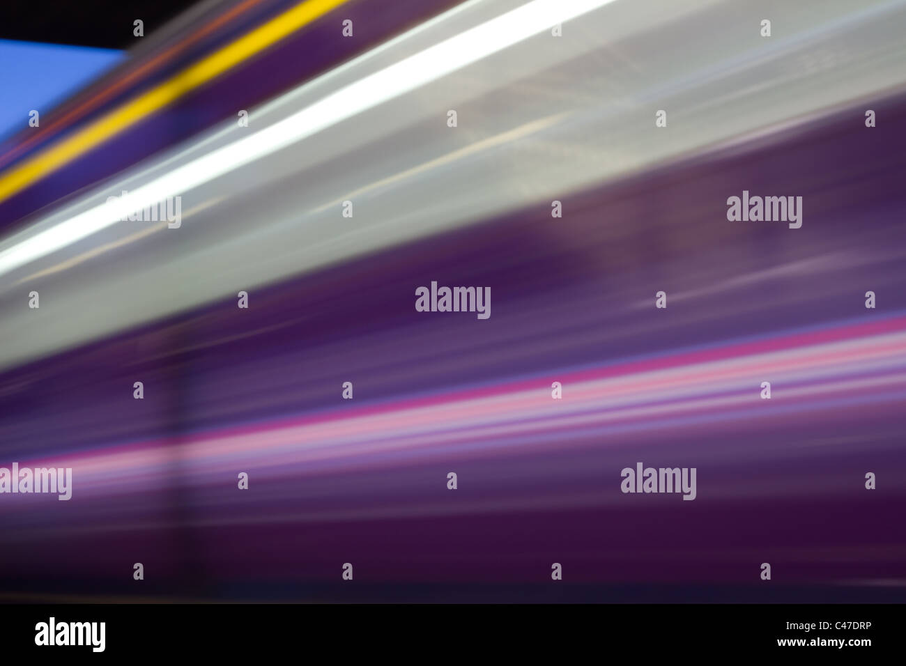 Slow shutter image of moving train, showing movement Stock Photo - Alamy