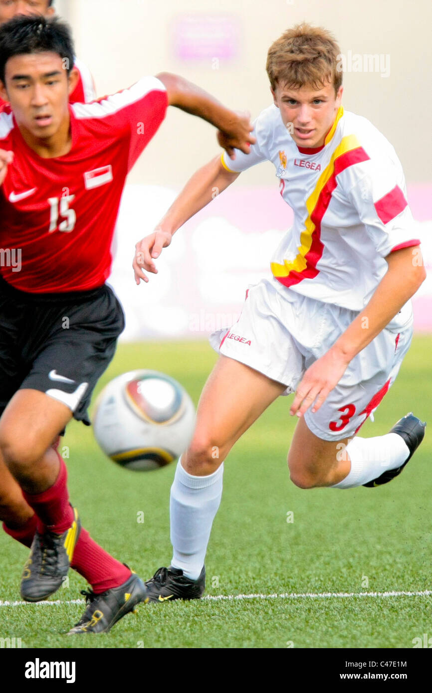 Montenegro's Igor Markovic(right) and Singapore's Bryan Neubronner(left ...