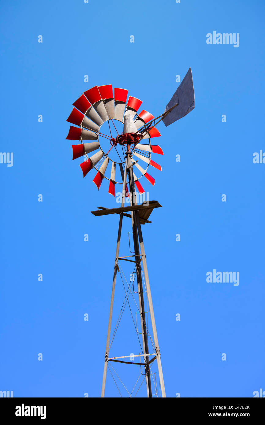 Windmill With Red Blades Stock Photo - Alamy