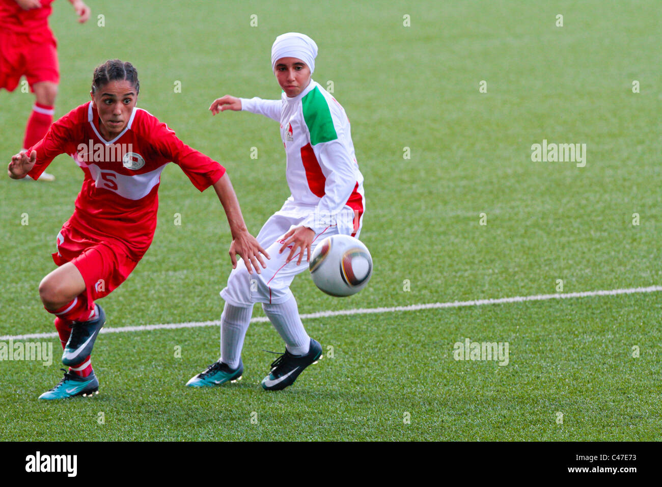 Turkey's Eda Karatas(red) is the first to react to the loose ball Stock ...