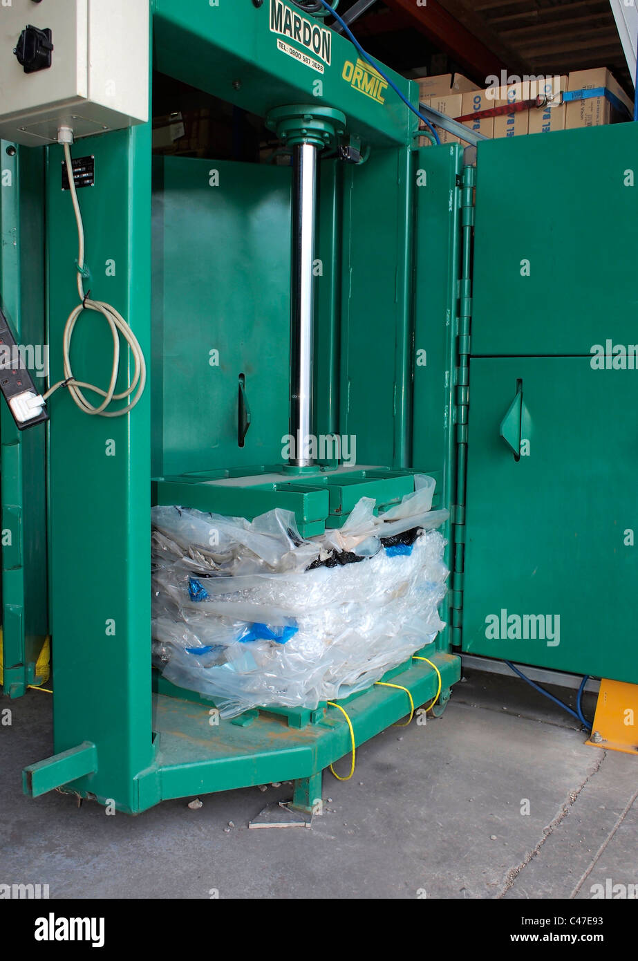 Polythene compacting machine Stock Photo - Alamy