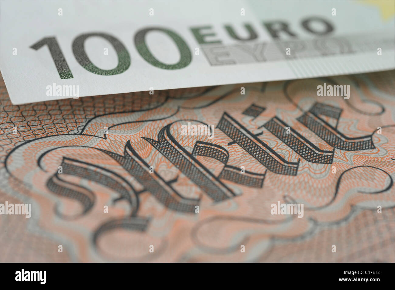German company stock share and Euro banknotes Stock Photo - Alamy