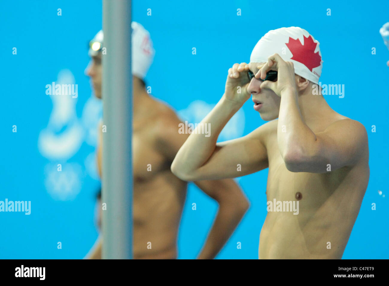 Kyle McIntee of Canada(right) during the swimmer introductions prior to ...