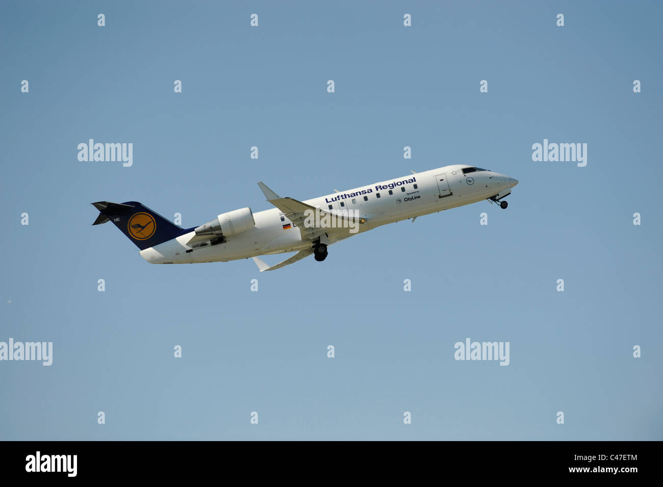 airplane of german airline Lufthansa-Regional at take-off from airport ...