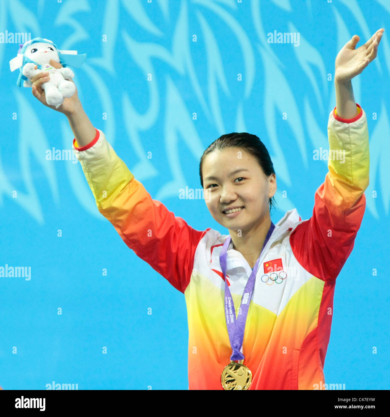 Women's 100m Butterfly Finals Gold Medalist, Liu Lan of China Stock ...