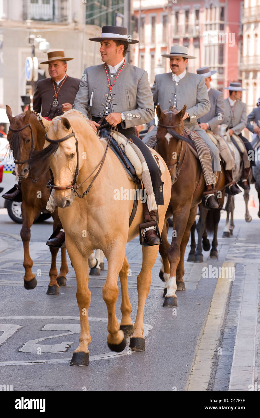 Men on horseback during a traditional fiesta in Granada Andalucia Spain ...